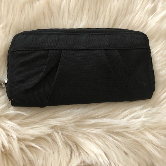 Travelon | Bags | Travelon Zip Around Wallet With Pinky Coral Lining ...